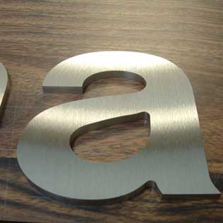 Letters and Numbers cut from aluminum with 50 finishes